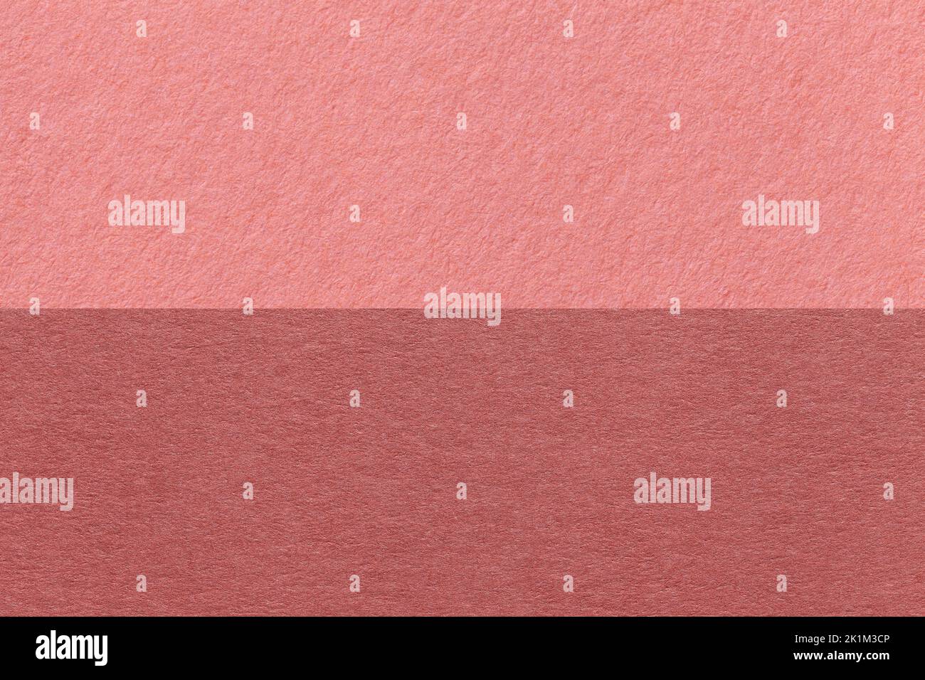 Texture of craft pink and maroon paper background, half two colors ...