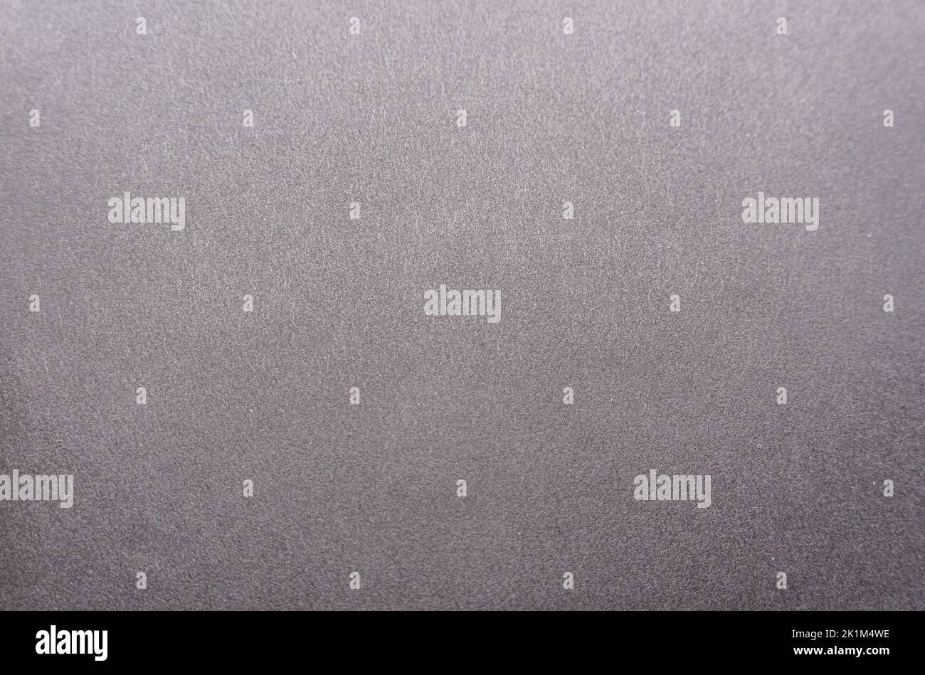 A gray black wall for inscriptions. Graphite wall. Wall for ads ...