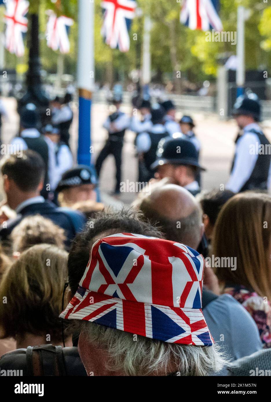 London September 2022: Union Jack hat among crowd A sad for the family ...
