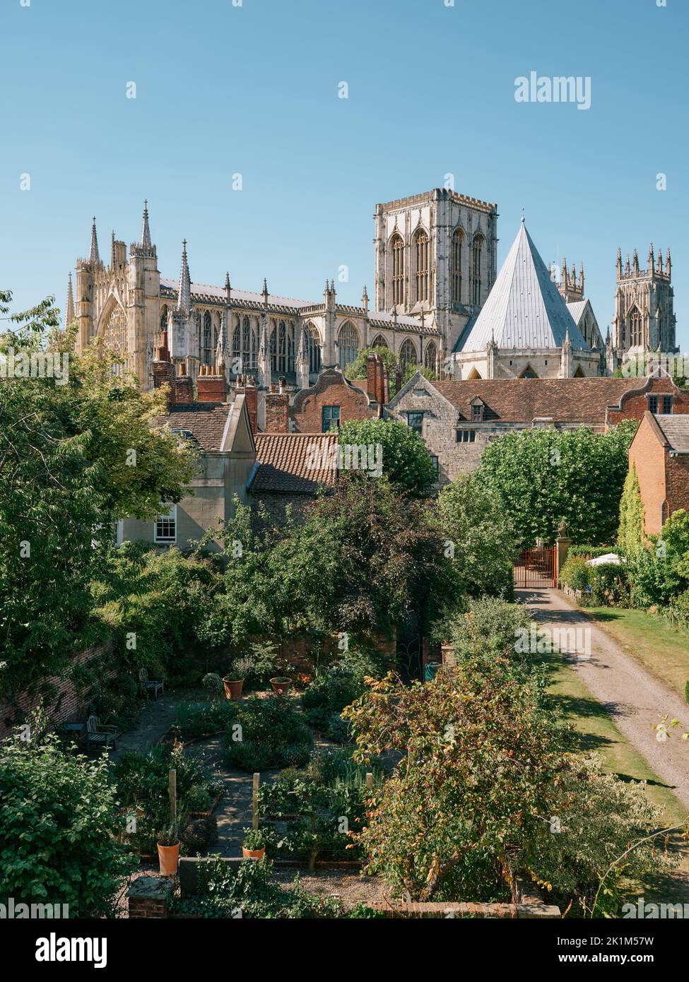York Cathedral / York Minster towers above the summer gardens and ...