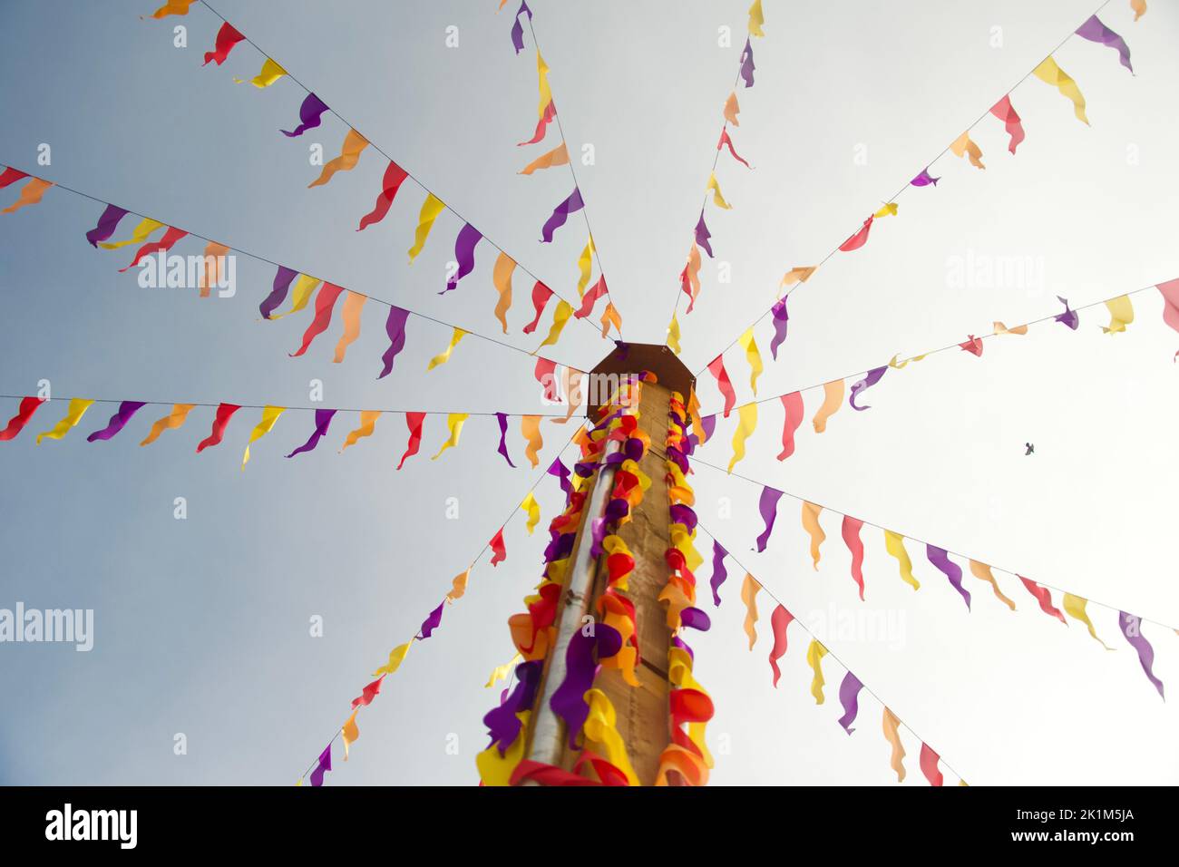 Flags leading from pole Stock Photo - Alamy