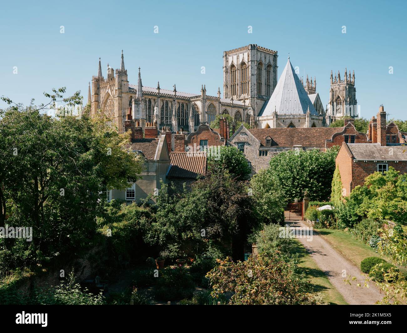 York Cathedral / York Minster towers above the summer gardens and ...