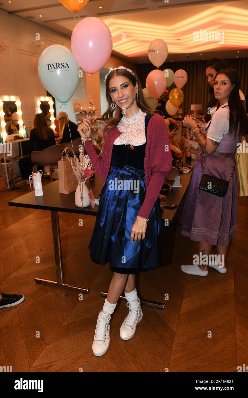Munich, Germany. 19th Sep, 2022. Presenter Cathy Hummels prepares for ...