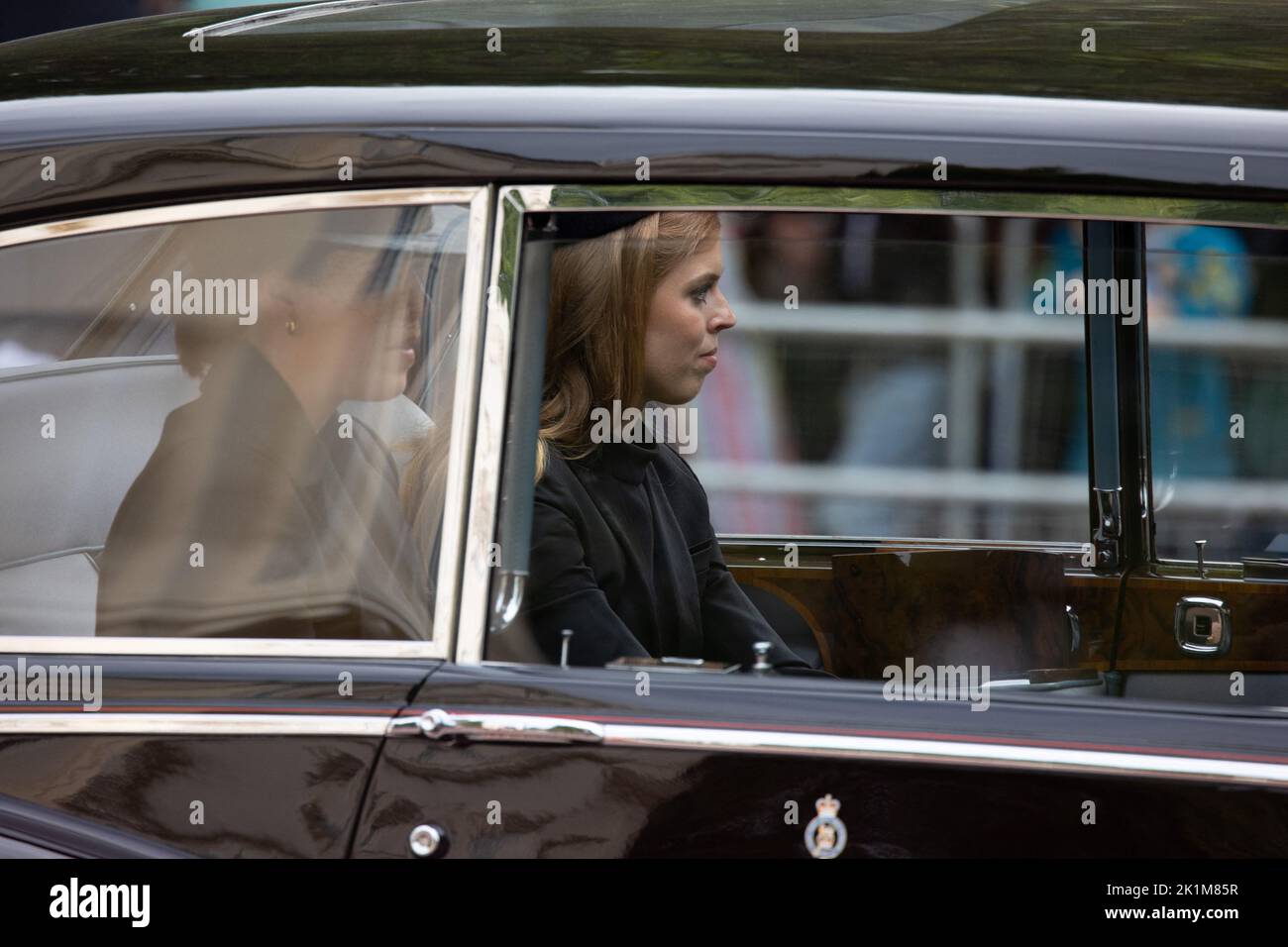 London, UK. 19th Sep, 2022. Princess Beatrice sits in a car as they ...