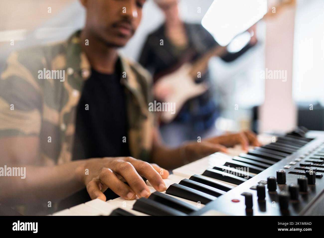 Man playing in band hi-res stock photography and images - Alamy