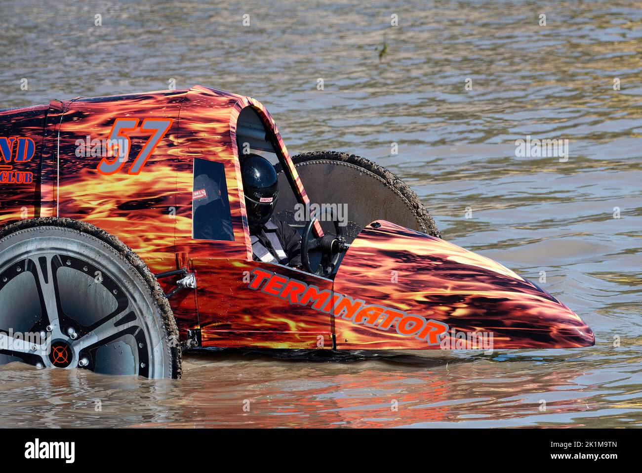 swamp buggy moving through water, action, close-up, colorful, jeep ...
