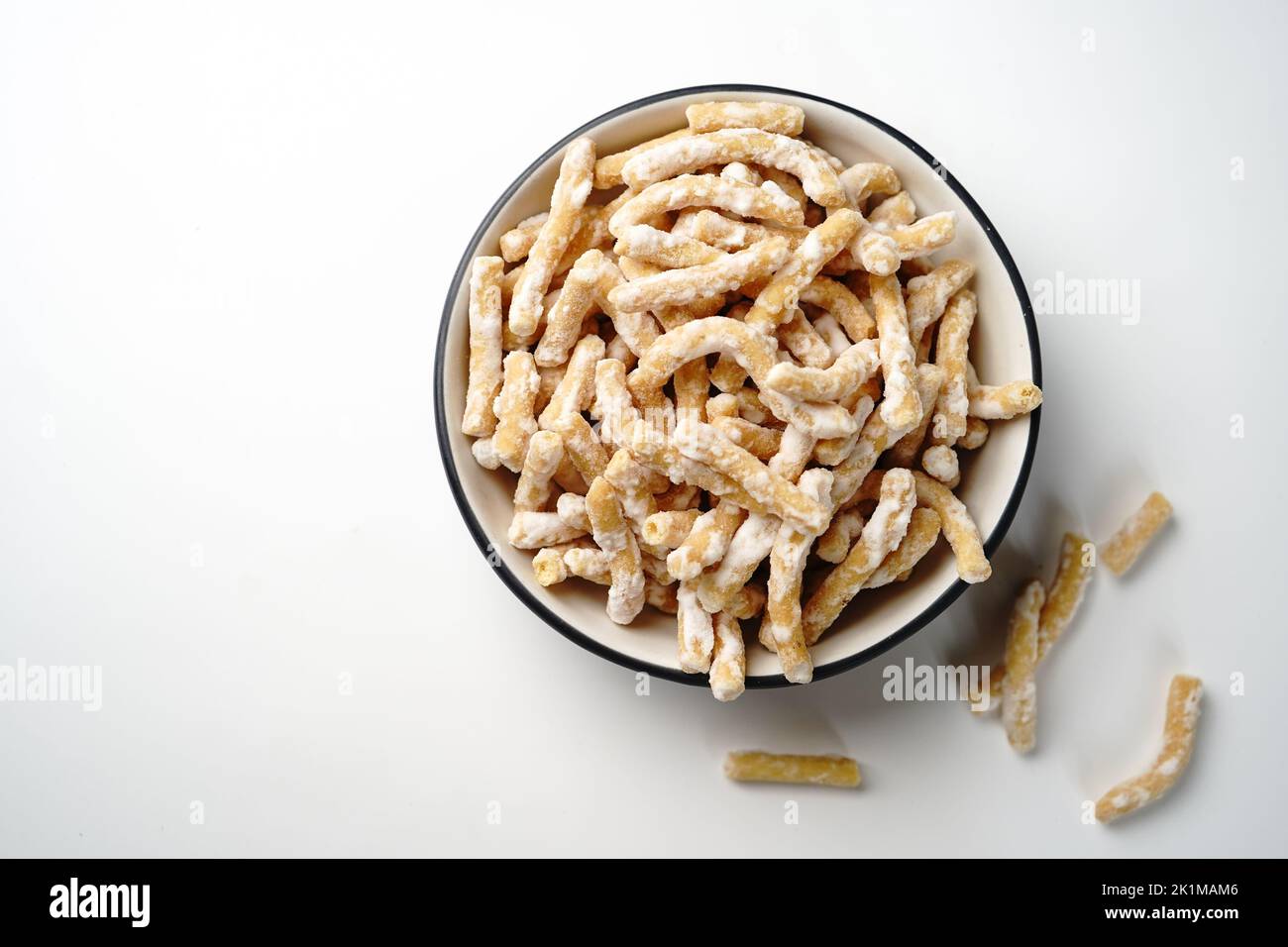 Sweet sev seerni seeni or madhura seva - deep fried Diwali snack with ...