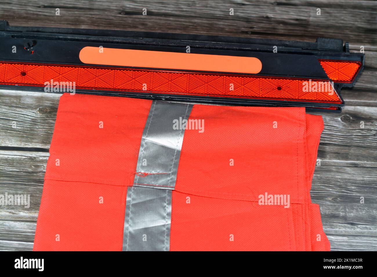 safety vest with reflective stripes and A warning foldaway reflective ...