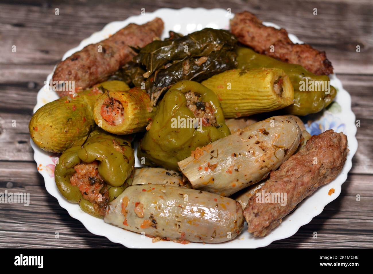 Stuffed squash zucchini Mahshi, eggplants, wrapped grape leaves, bell ...