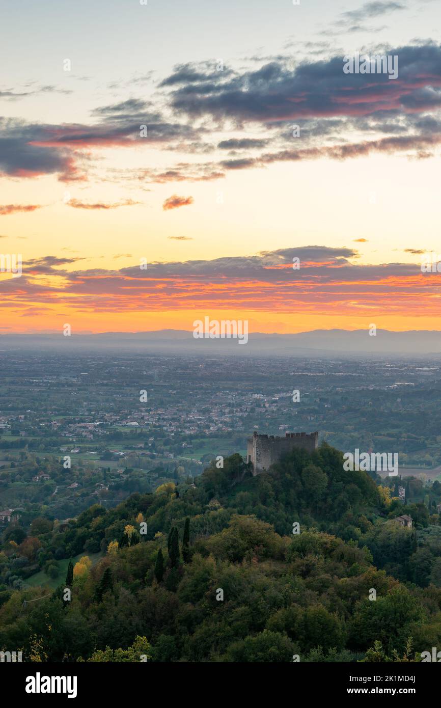 A vertical shot of the Rocca di Asolo in the sunset Stock Photo - Alamy