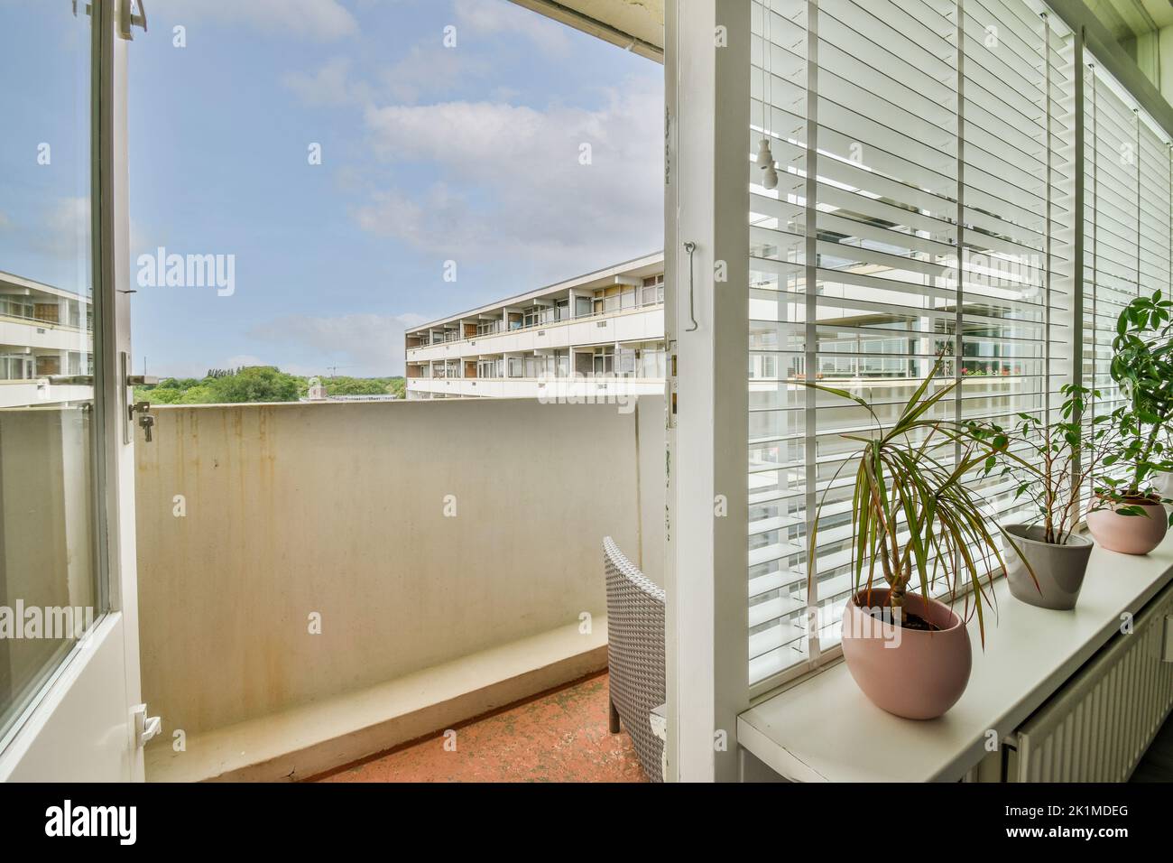 Sitting area in balcony with comfortable furniture around beautiful ...