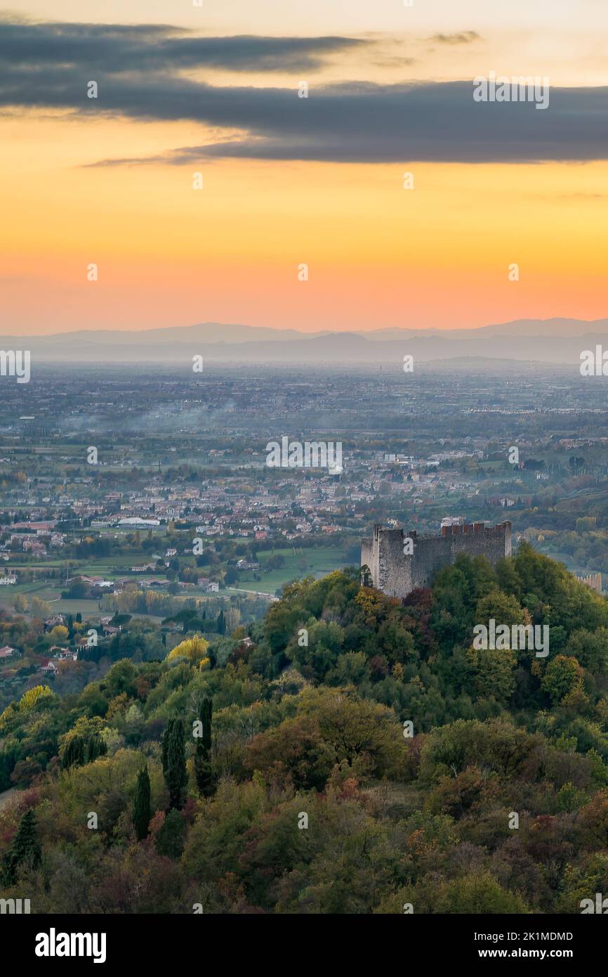 A vertical shot of the Rocca di Asolo in the sunset Stock Photo - Alamy