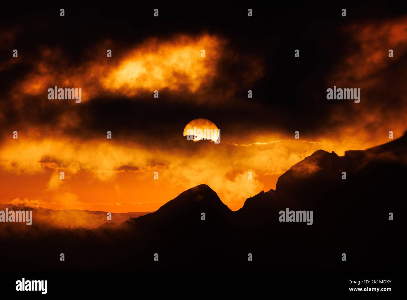 dramatic firy sunset in the fribourg alps Stock Photo - Alamy