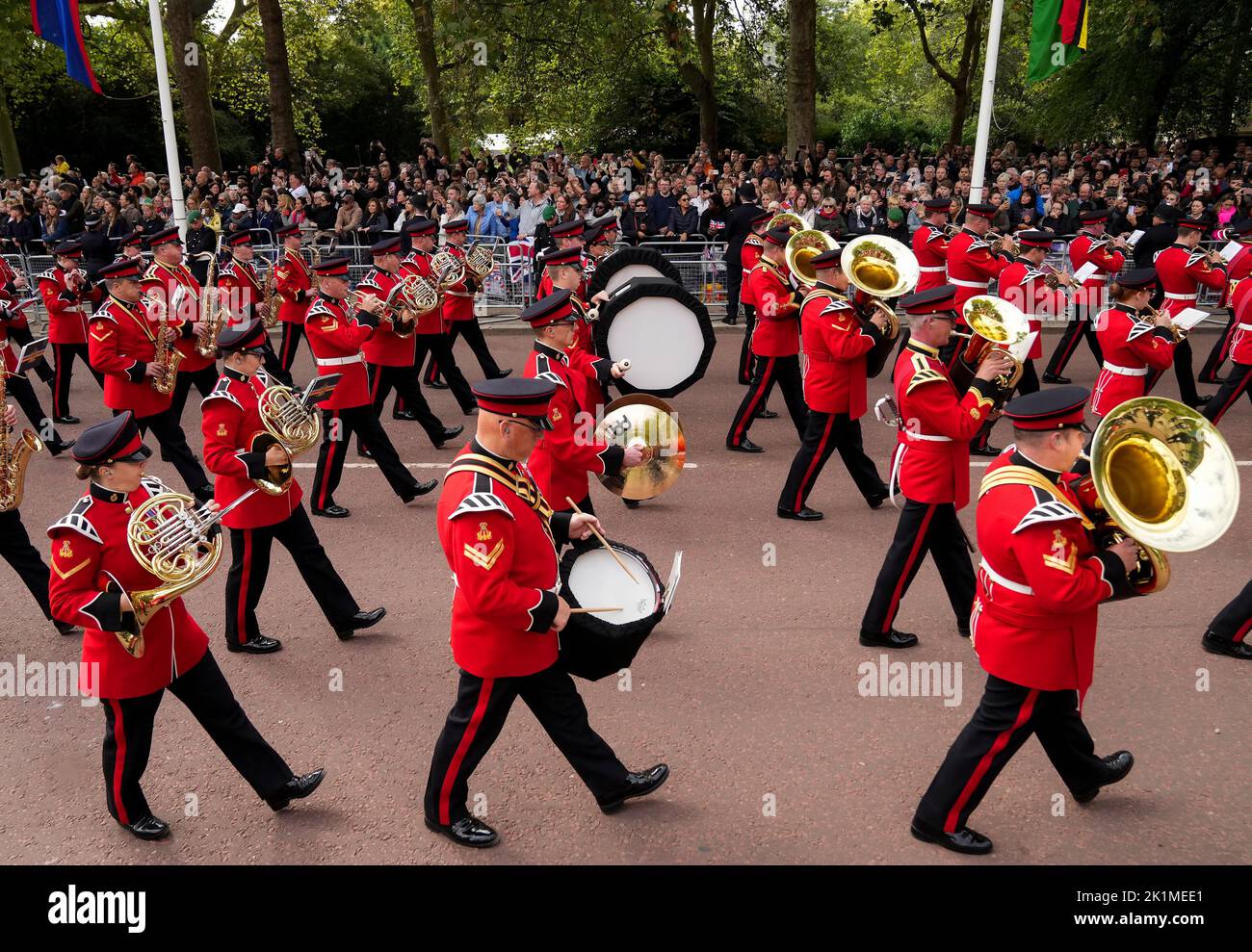 London, UK . 19th Sep, 2022. A marching band plays as the coffin of ...