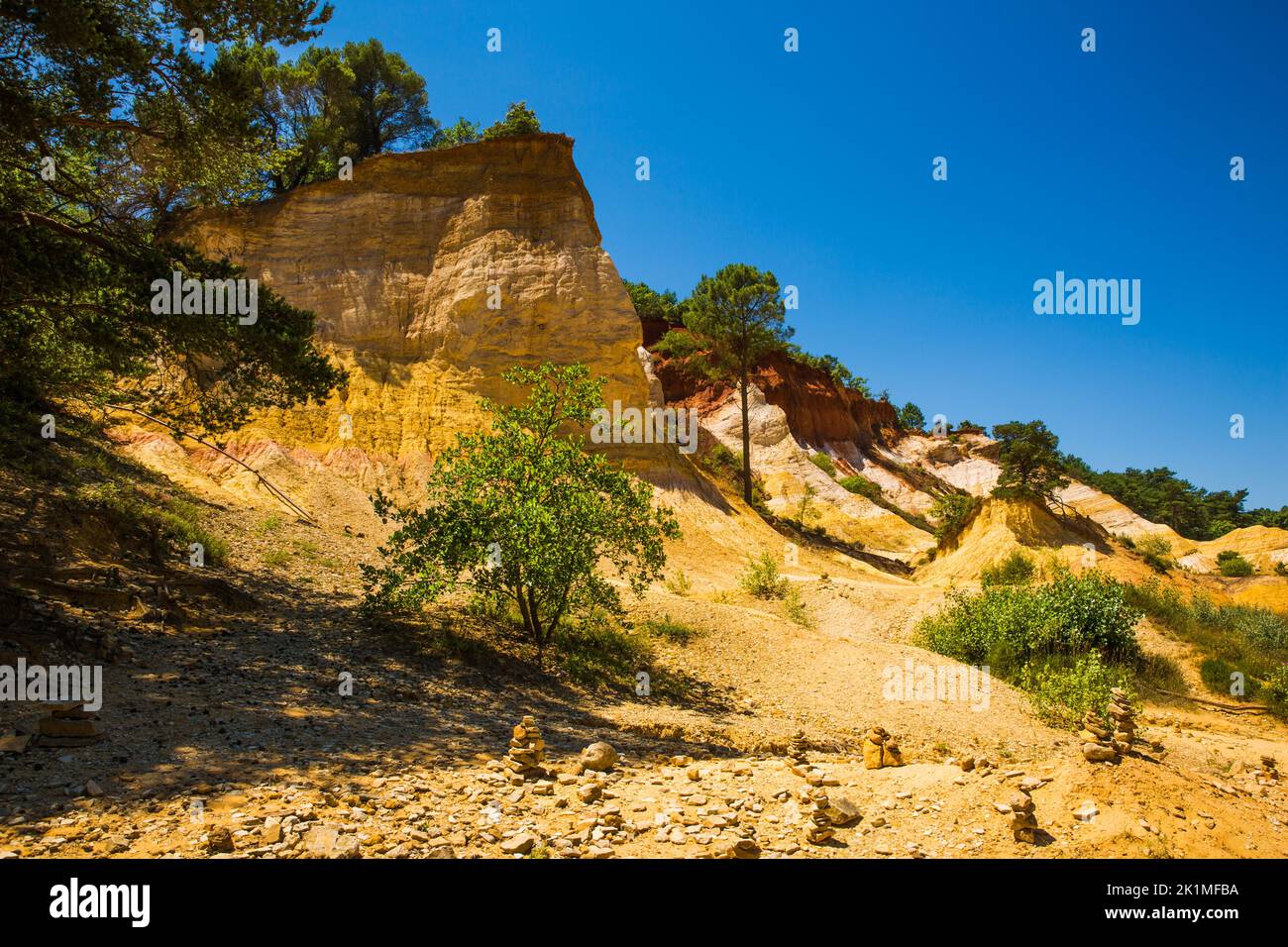 Cairns Formations in front of Colourful Ochres of the French Provencal ...