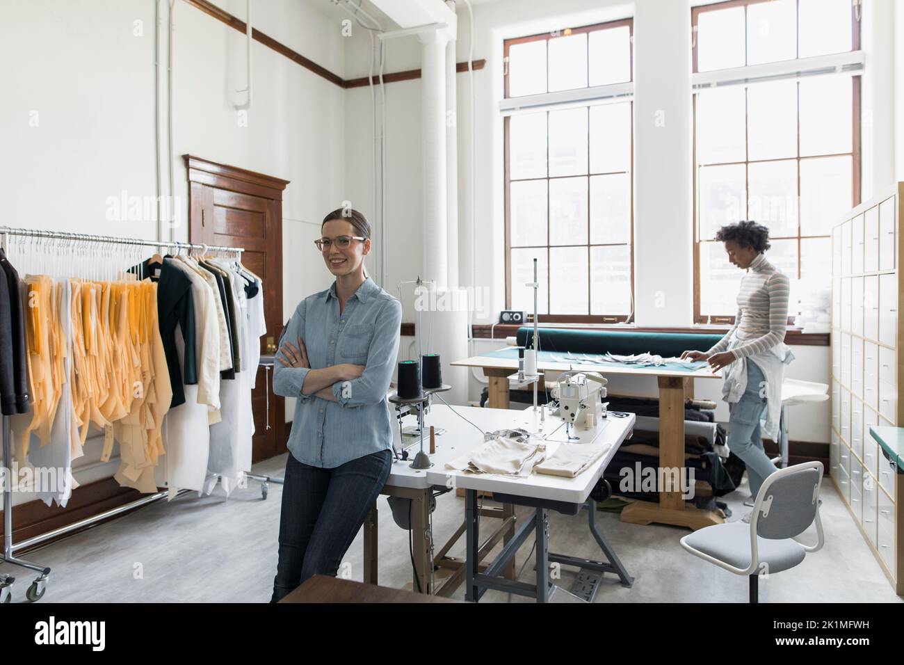 Portrait of woman in fabric design studio Stock Photo - Alamy