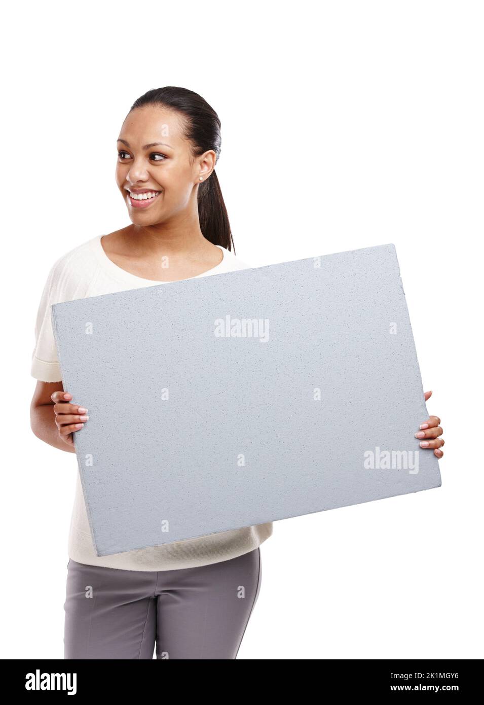 She comes with her own board. a young woman holding an empty board ...