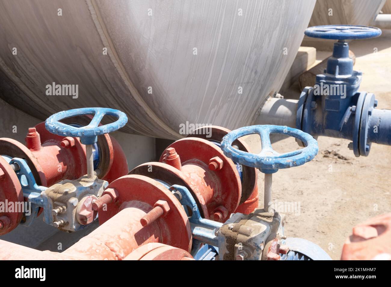 Huge industrial pipes with tap storage tank container for liquid. the ...