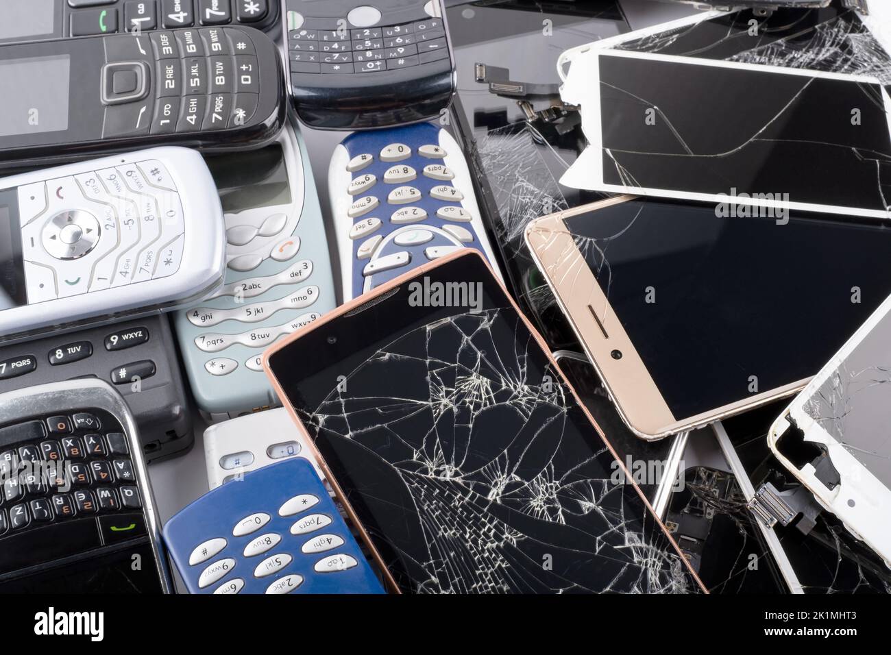 Heap of Old Mobile with buttons are broken and crushed Screen Glass Lcd ...