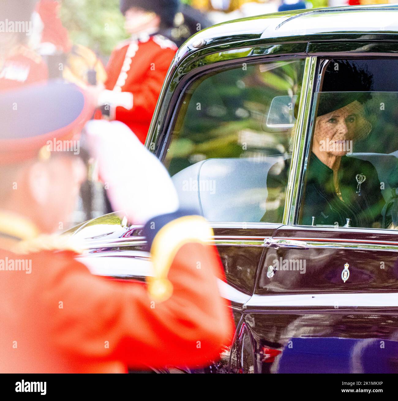 Queen Consort Camilla follow Her Majesty the Queen's coffin on foot as ...