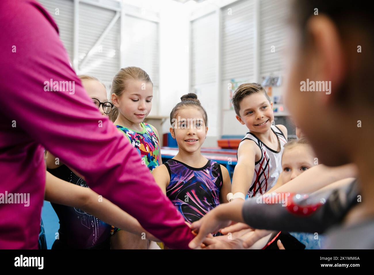 Child gymnast support hi-res stock photography and images - Alamy