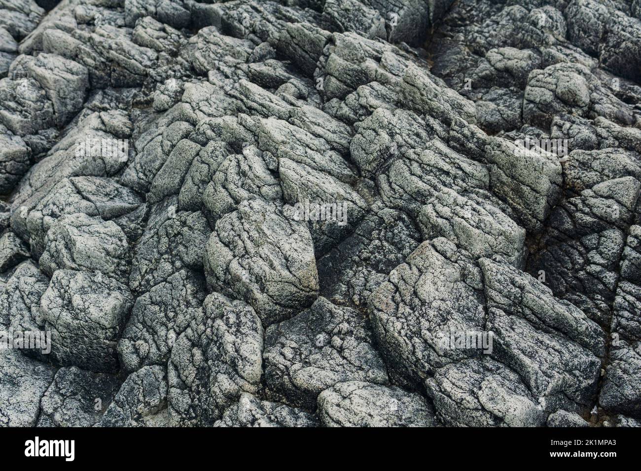 natural stone background, the gray rough lava basalt rock Stock Photo ...