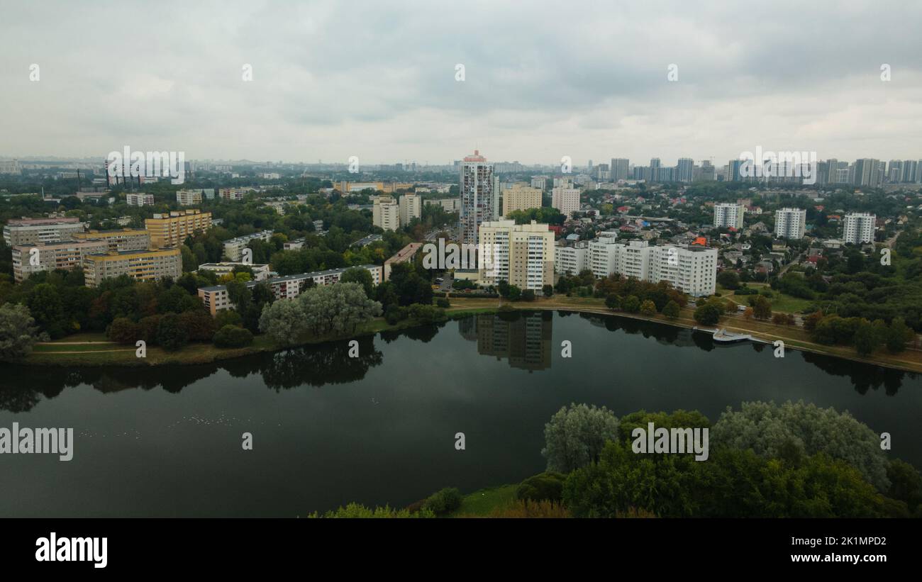 Lake in the city park. Urban landscape. Dormitory area of a big city ...