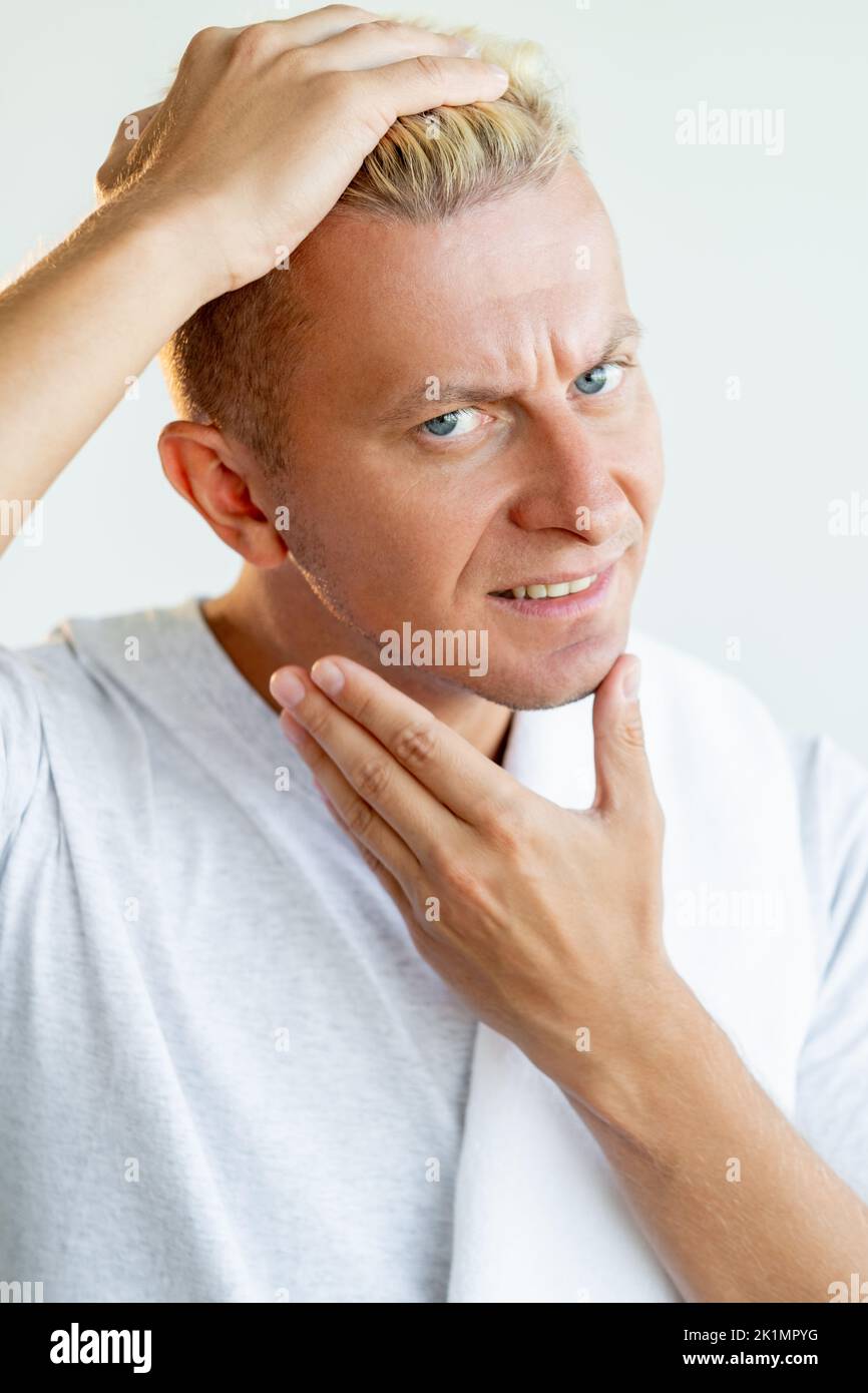 Male skincare. Acne problem. Dermatology procedure. Portrait of ...