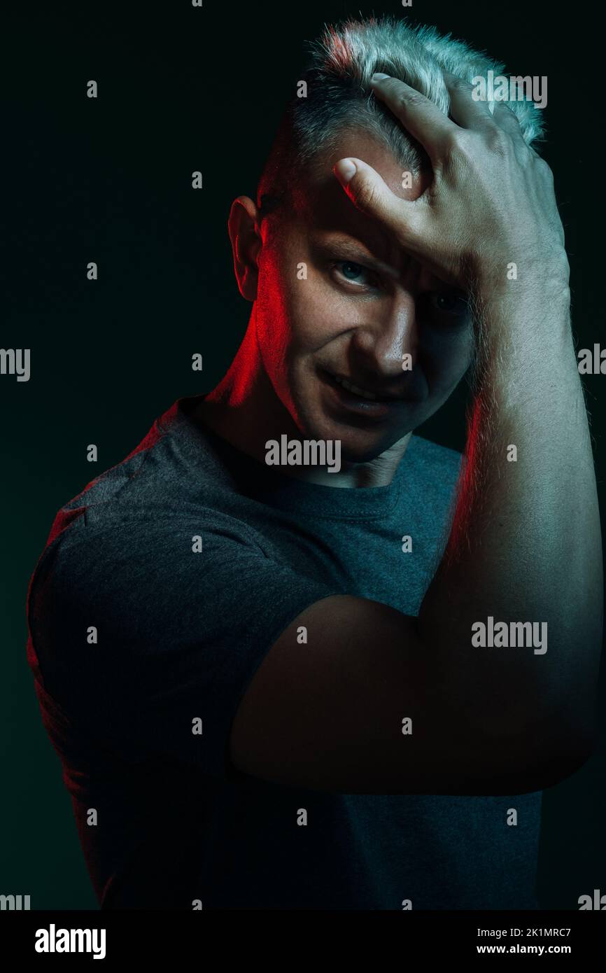 Macho lifestyle. Neon light portrait. Male confidence. Strong athletic ...