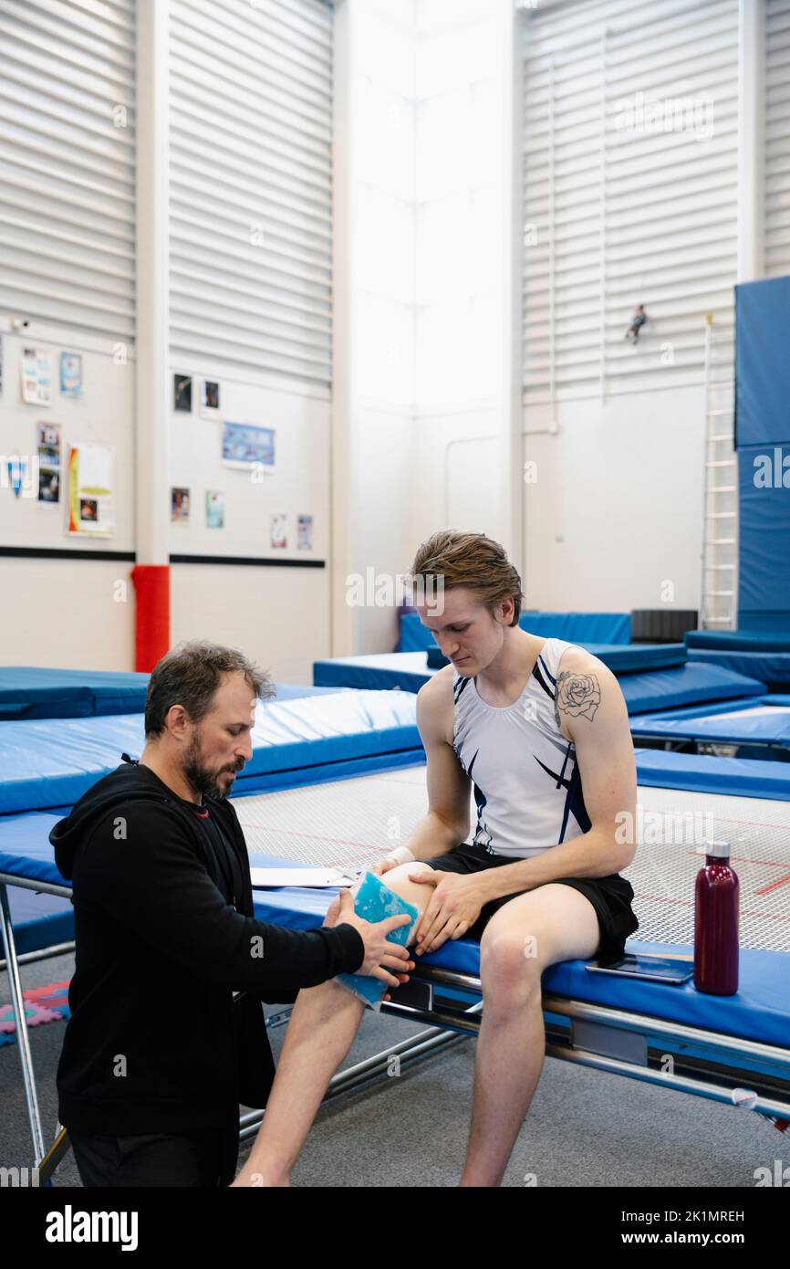 Injured athlete and coach hi-res stock photography and images - Alamy