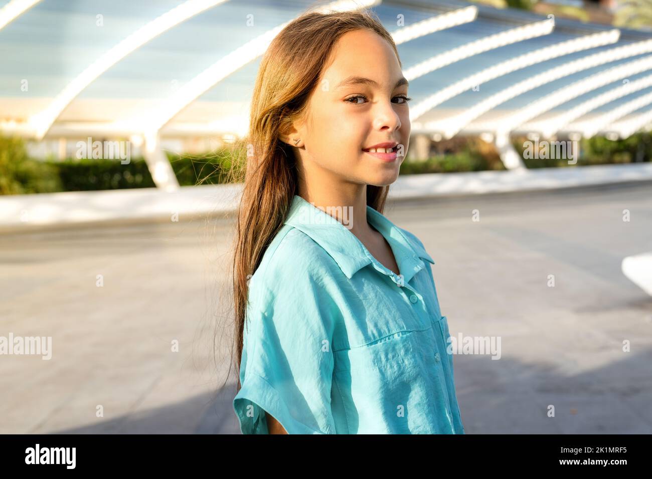 Cute chill kid girl walking in the city Stock Photo - Alamy