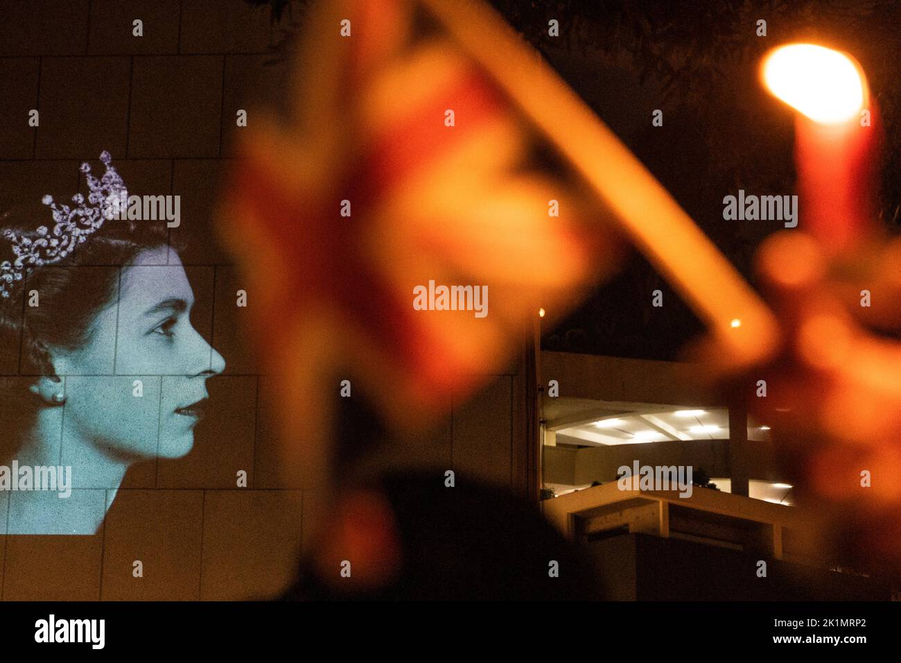 A portrait of Queen Elizabeth II seen outside the British Consulate as ...