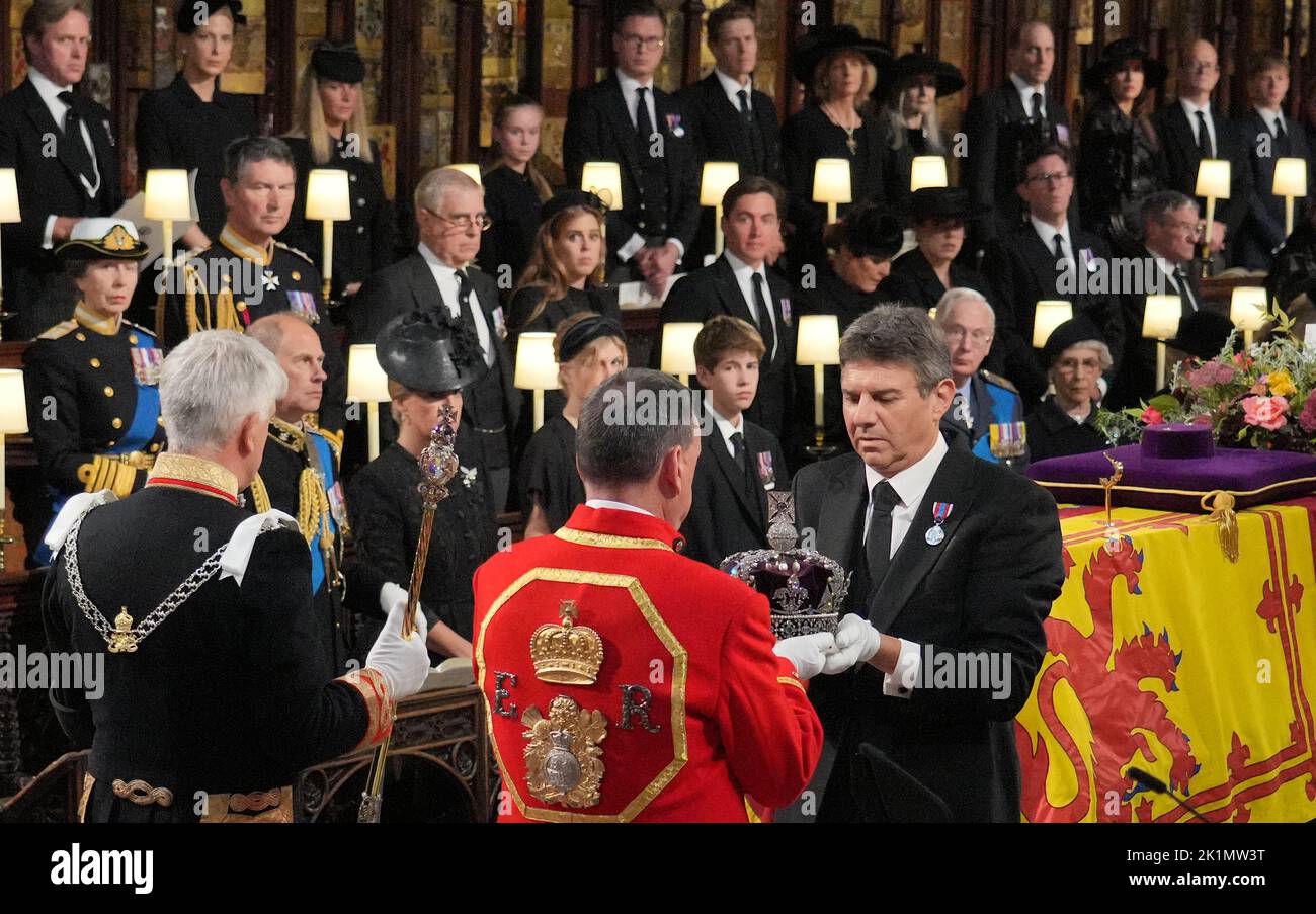 The Imperial State Crown is removed from the coffin by the Crown ...