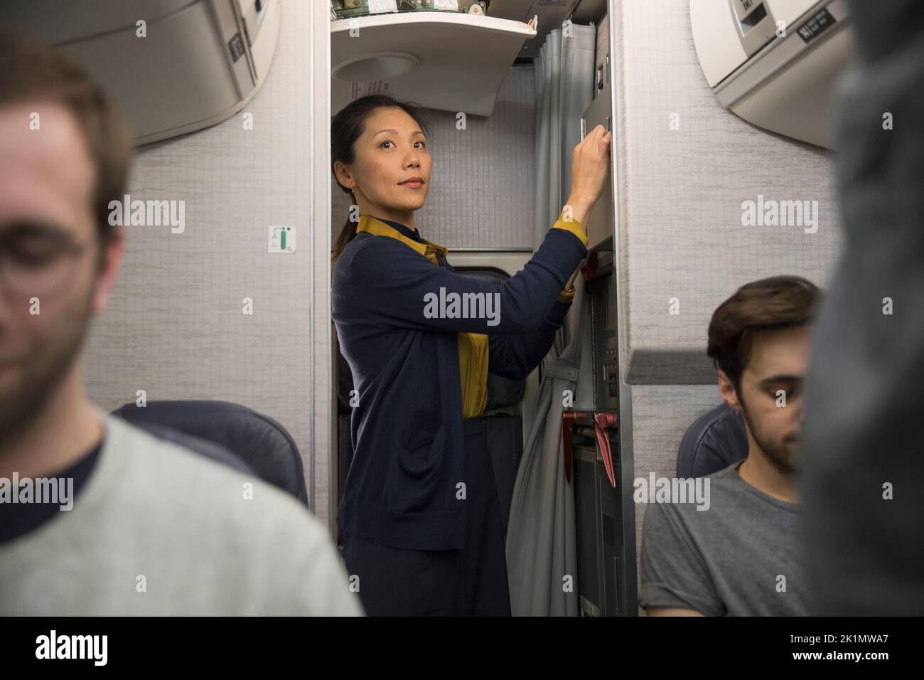 Flight attendant cabin hi-res stock photography and images - Alamy