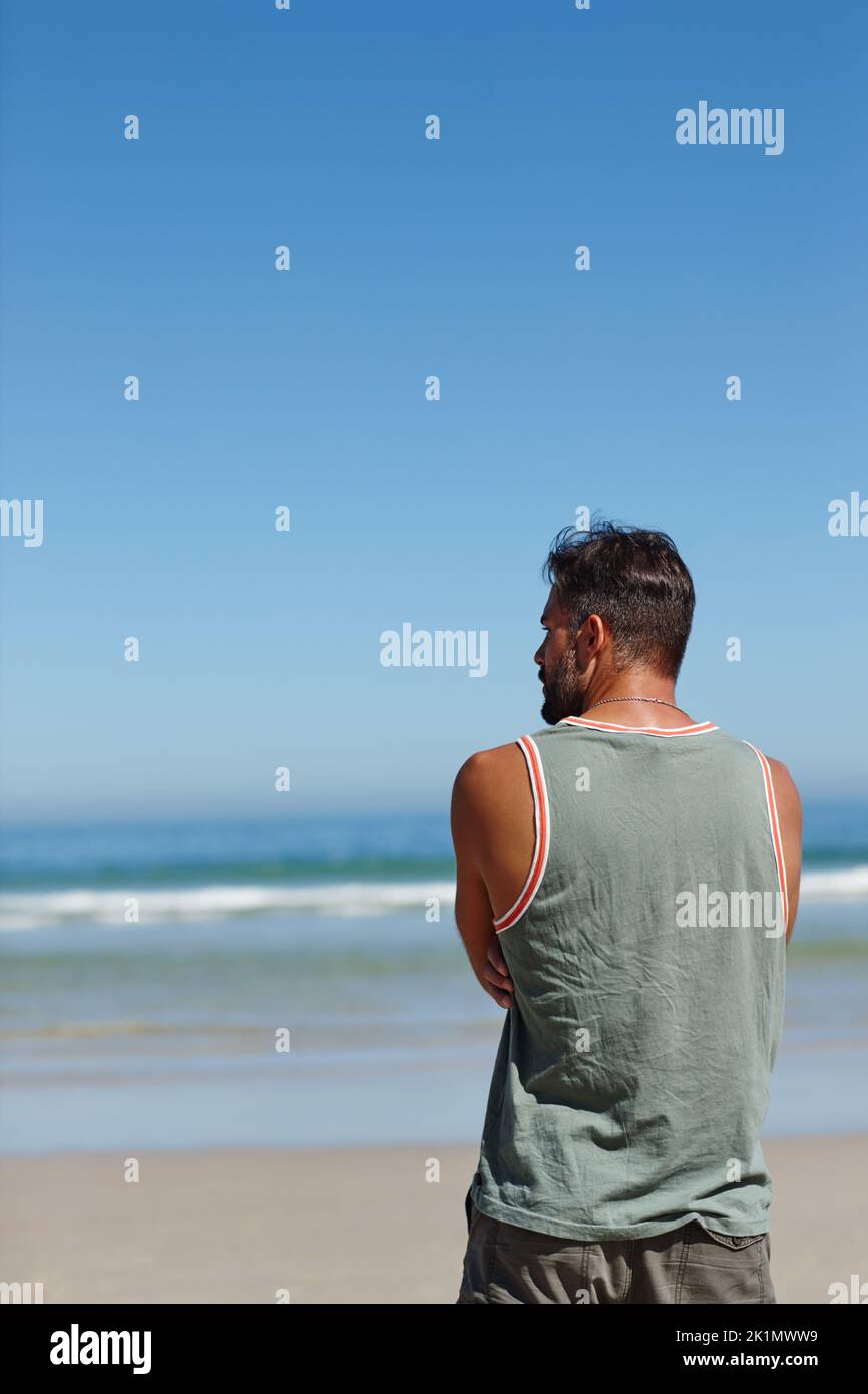 Man looking into ocean hi-res stock photography and images - Alamy