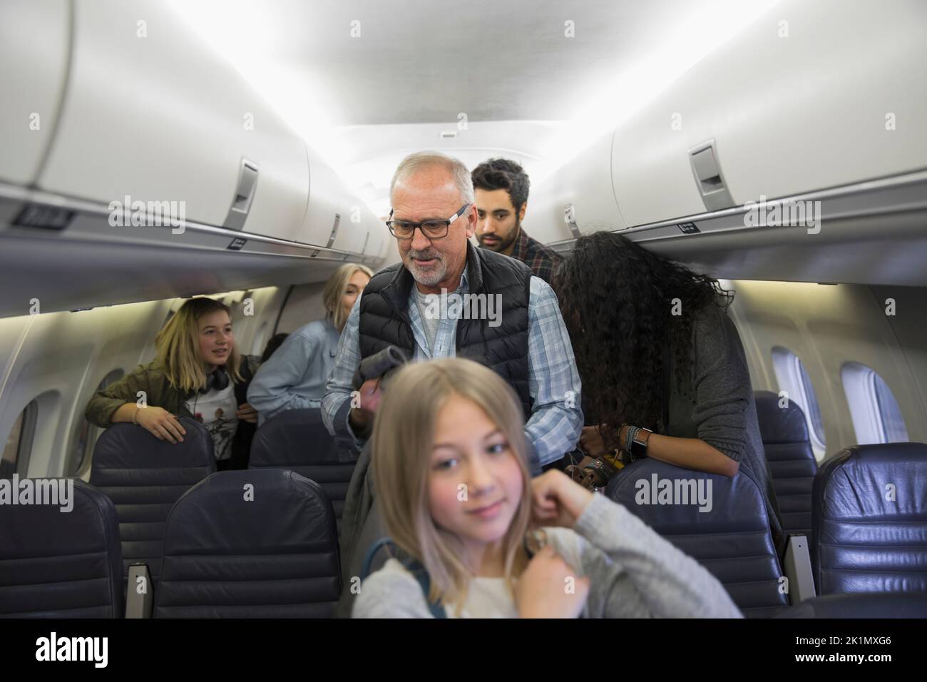 Airplane aisle cabin hi-res stock photography and images - Alamy