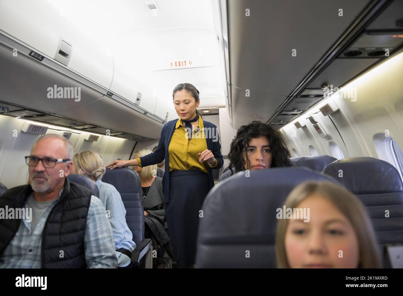 Airplane aisle cabin hi-res stock photography and images - Alamy