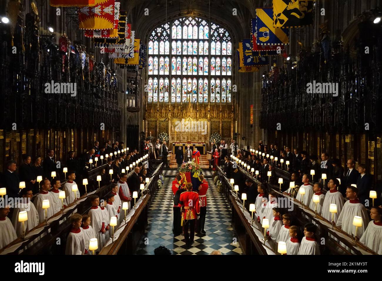 The coffin of Queen Elizabeth II is carried into St George's Chapel in ...