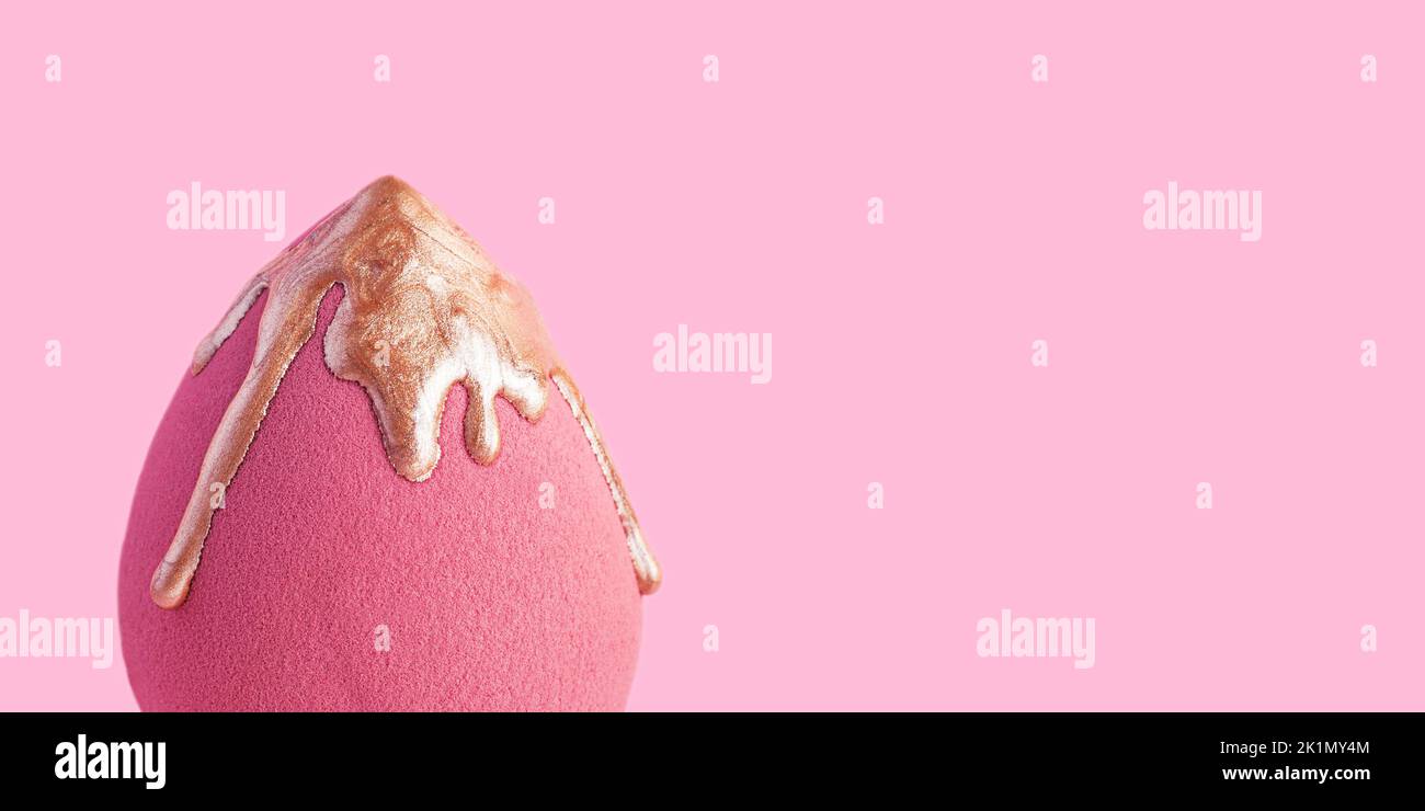Closeup photography of beauty blender with dripping bronzer on it ...