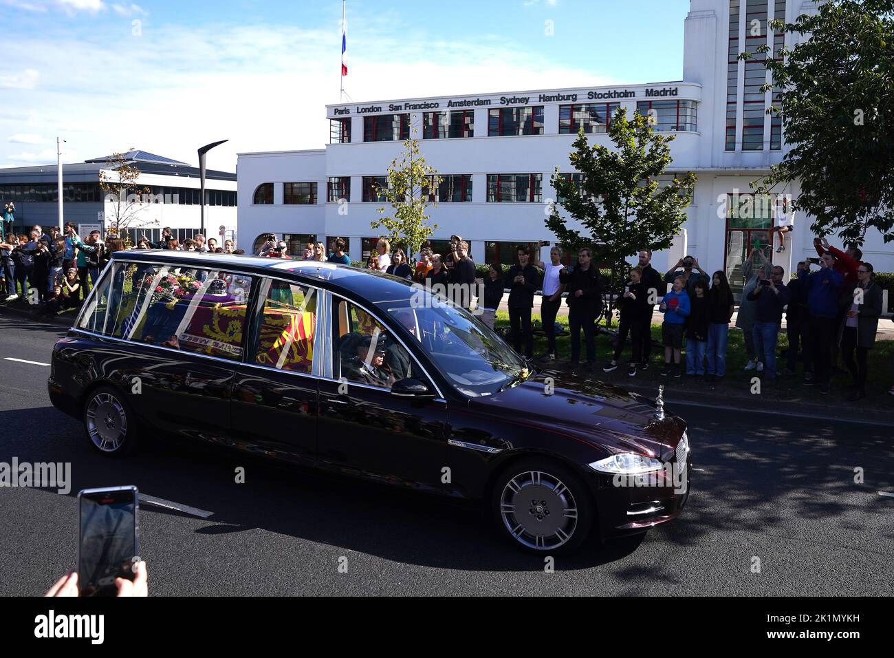 The State Hearse carries the coffin of Queen Elizabeth II, draped in ...
