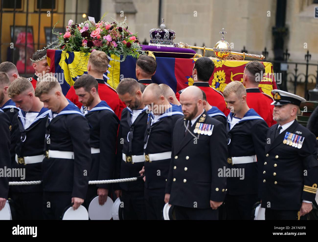 The coffin of Queen Elizabeth II, draped in the Royal Standard with the ...
