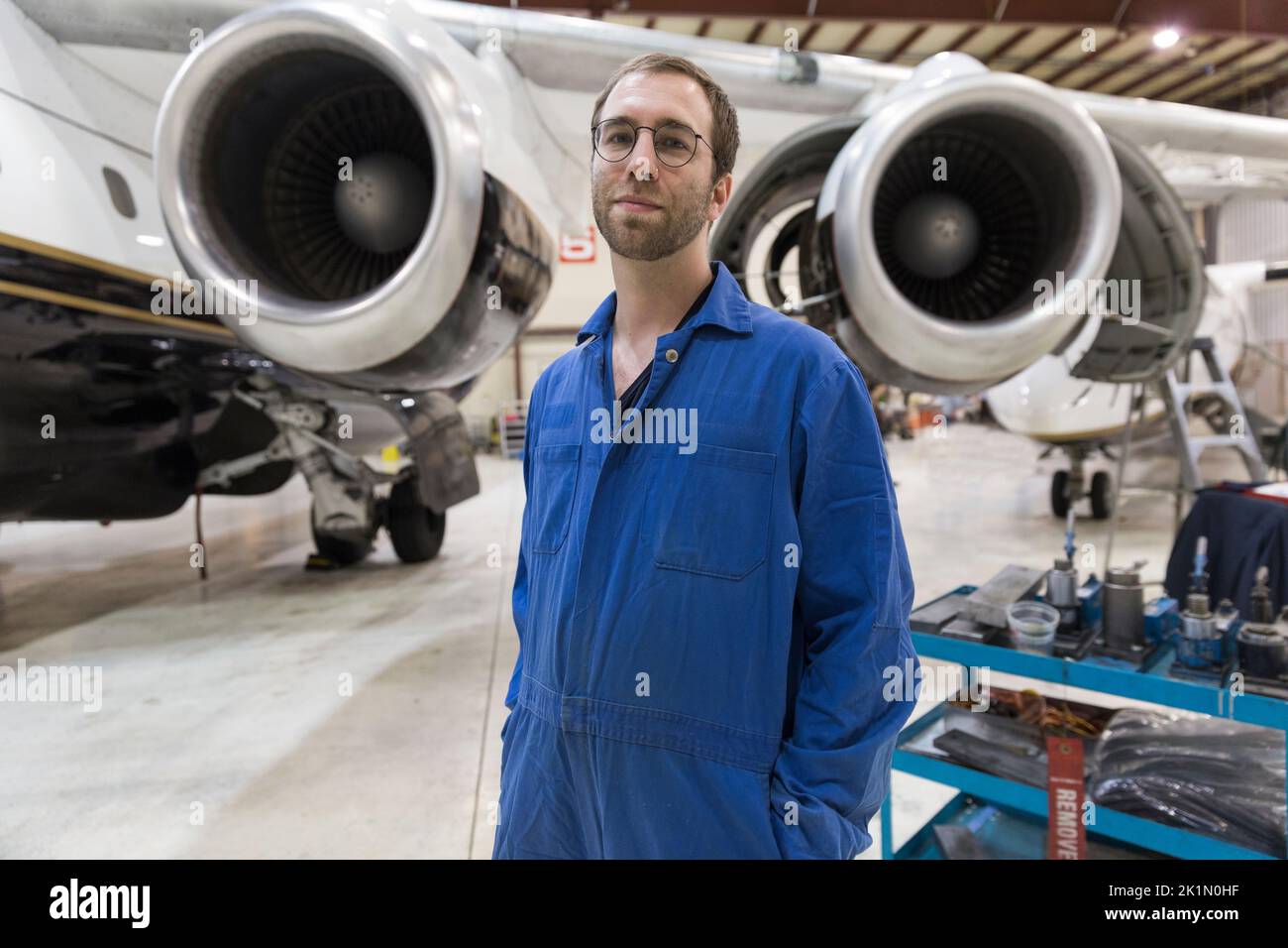 Portrait confident male airplane maintenance engineer in hangar Stock ...