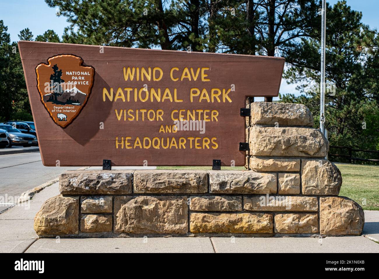 Sign for Wind Cave National Park visitor center and headquarters with ...