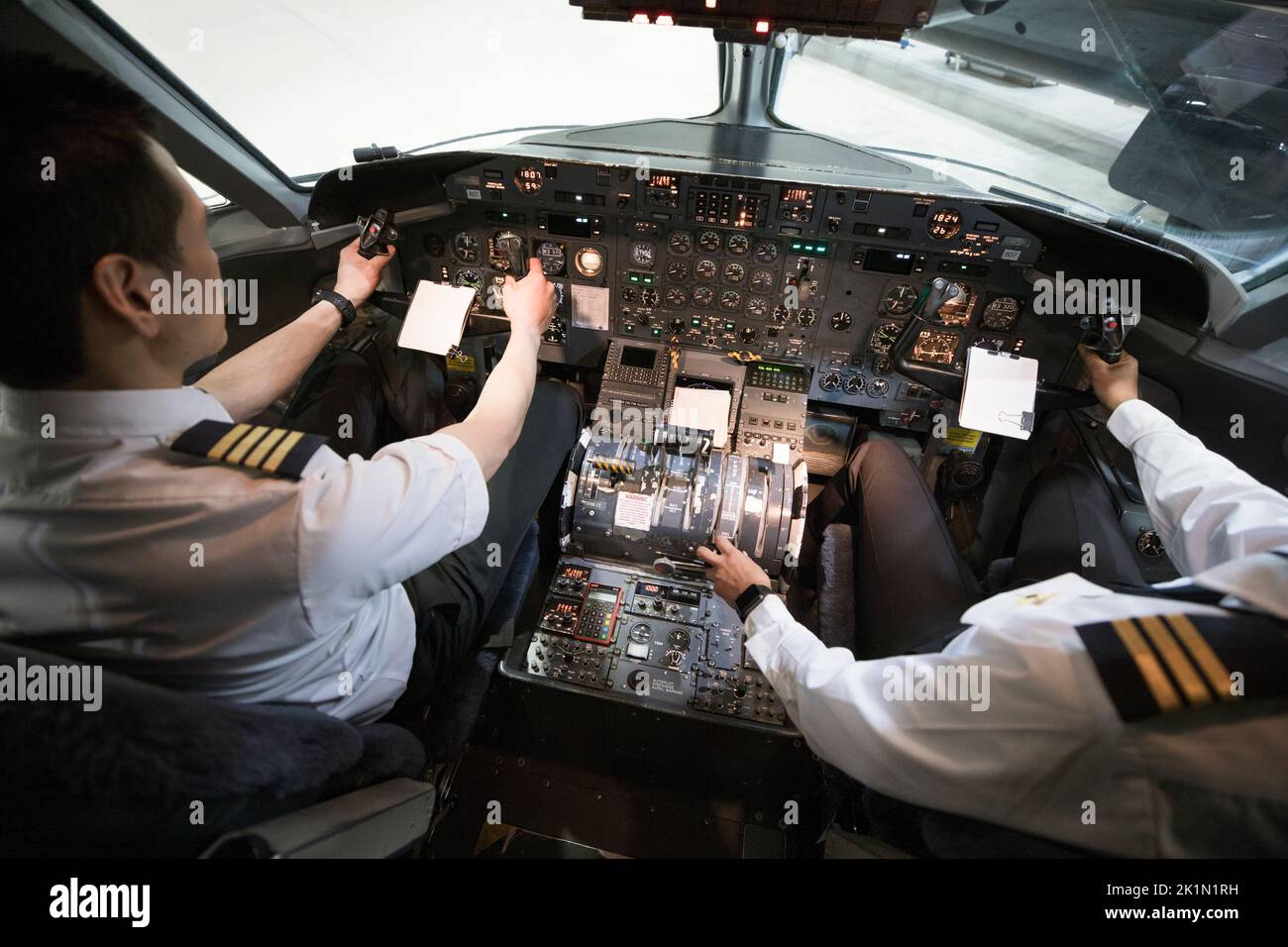 Rear view pilots in cockpit hi-res stock photography and images - Alamy