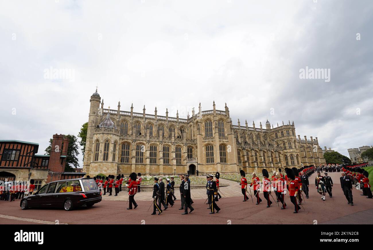The State Hearse carries the coffin of Queen Elizabeth II, draped in ...