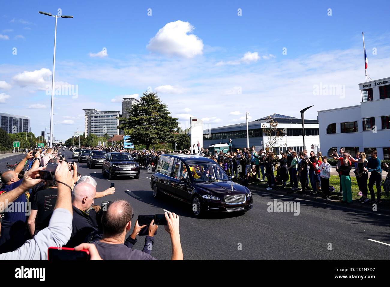 The State Hearse carries the coffin of Queen Elizabeth II, draped in ...