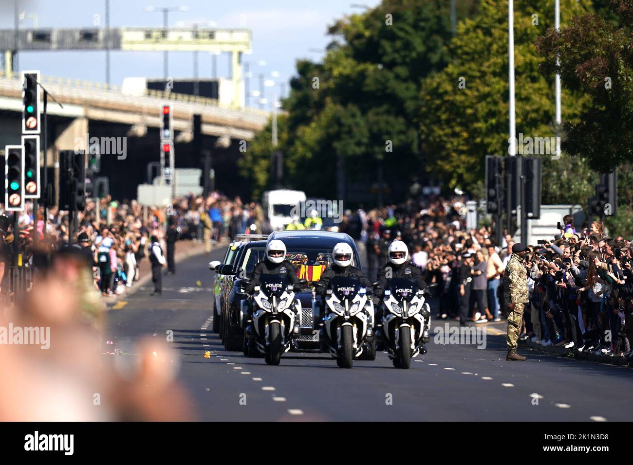 The State Hearse carries the coffin of Queen Elizabeth II, draped in ...