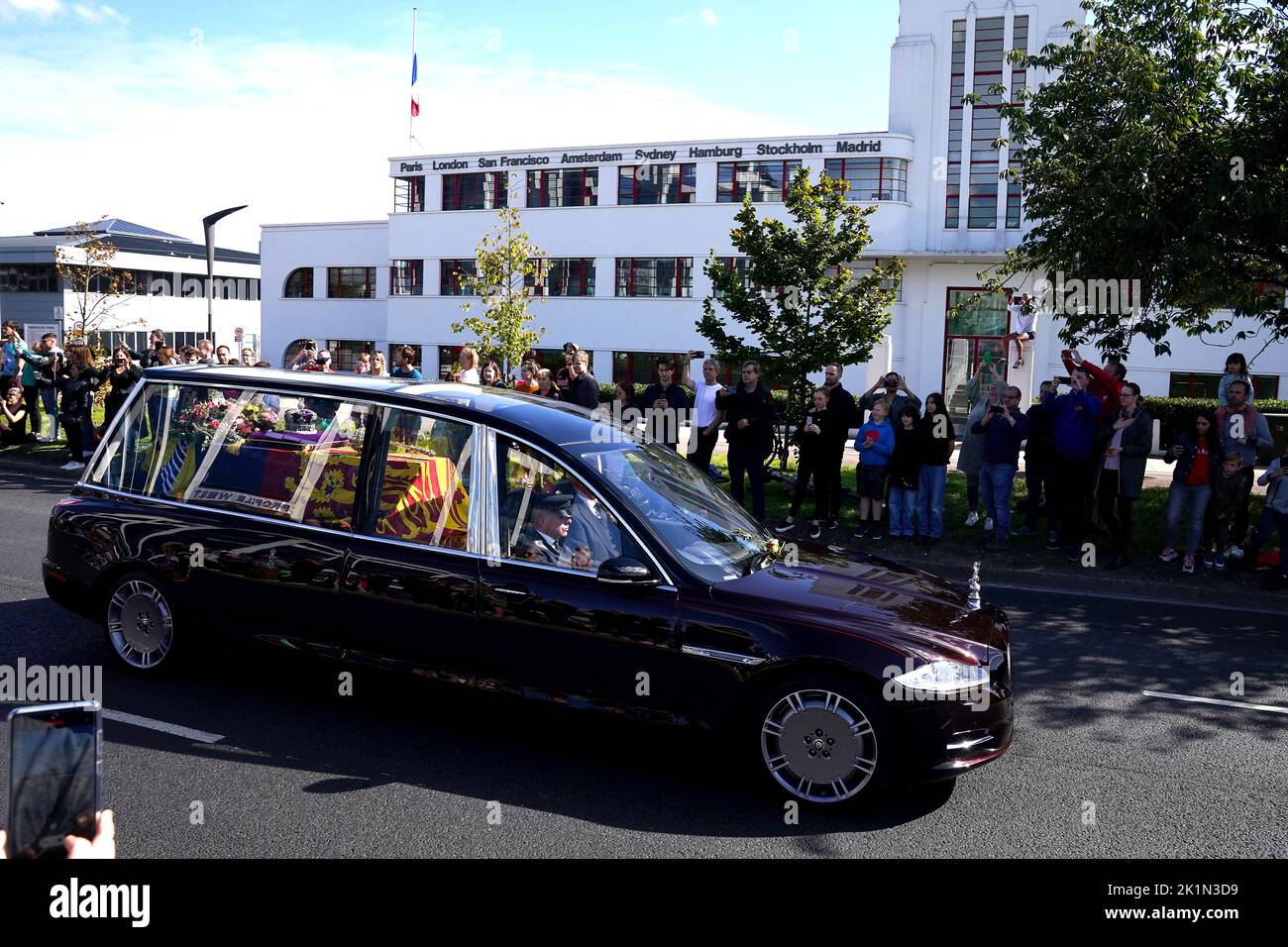 The State Hearse carries the coffin of Queen Elizabeth II, draped in ...