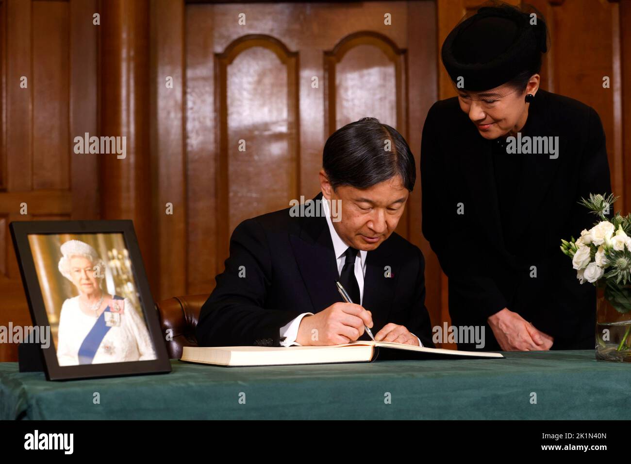 Emperor of Japan, Naruhito, and wife Empress, Masako, sign a book of ...