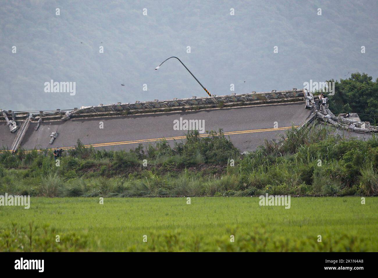 Yuli, Hualien County, Taiwan. 19th Sep, 2022. A photojournalist takes ...